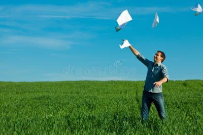 Young man throwing a paper stock photo. Image of satisfaction - 16737776