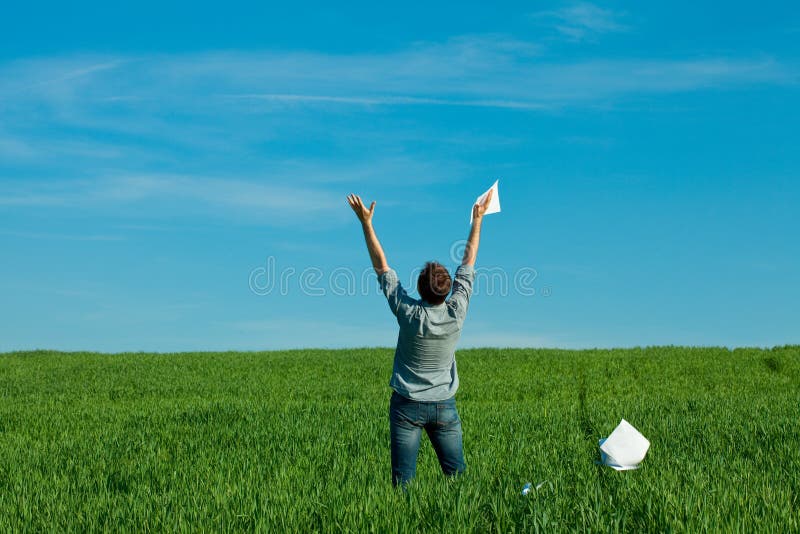 Young man throwing a paper stock image. Image of business - 16737763