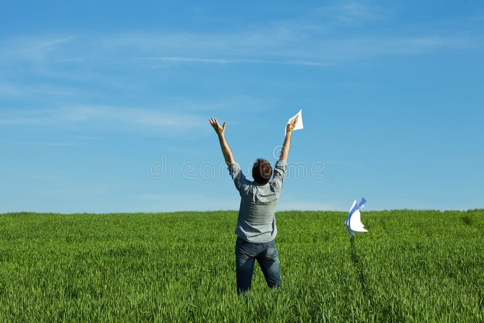 Young man throwing a paper stock photo. Image of motion - 18226914