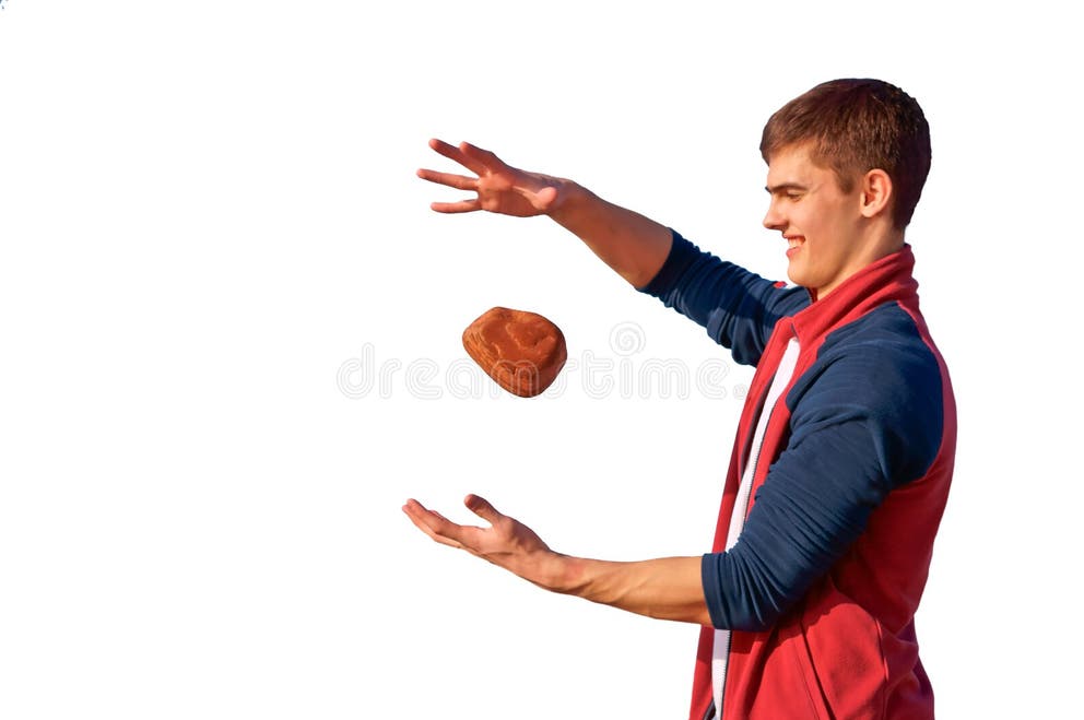 A Young Man with a Stone, Levitation, a Young Man Throws Stones Stock ...