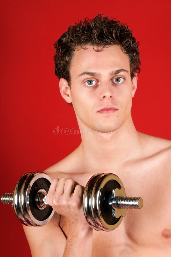 Young Man Training with Dumbbell Stock Photo - Image of training ...