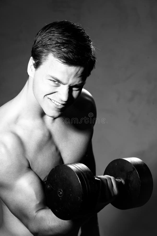 Young Man Training with Dumbell Stock Photo - Image of lifestyle ...
