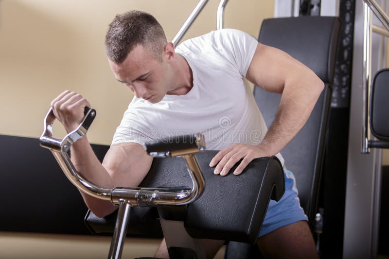 Young Man Training in the Gym Stock Image - Image of lifestyle ...