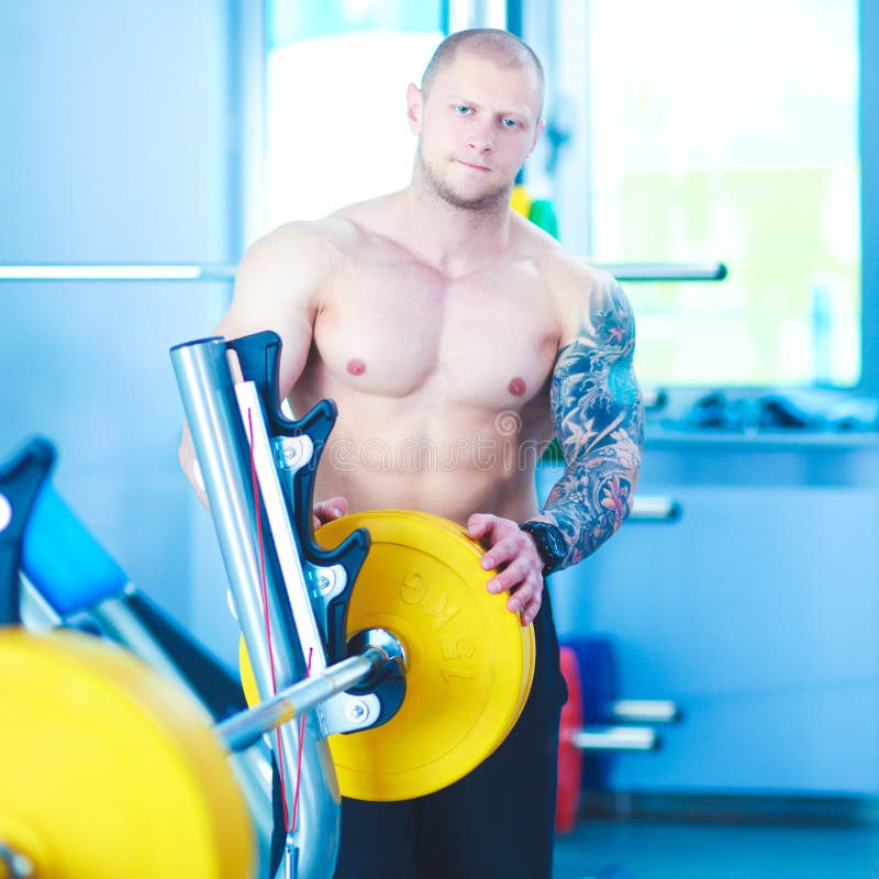 Young Man Training At Gym With Exercises Stock Image - Image of muscle ...
