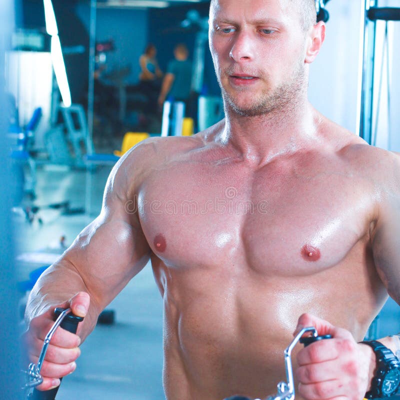 Young Man Training at Gym with Exercises Stock Photo - Image of energy ...