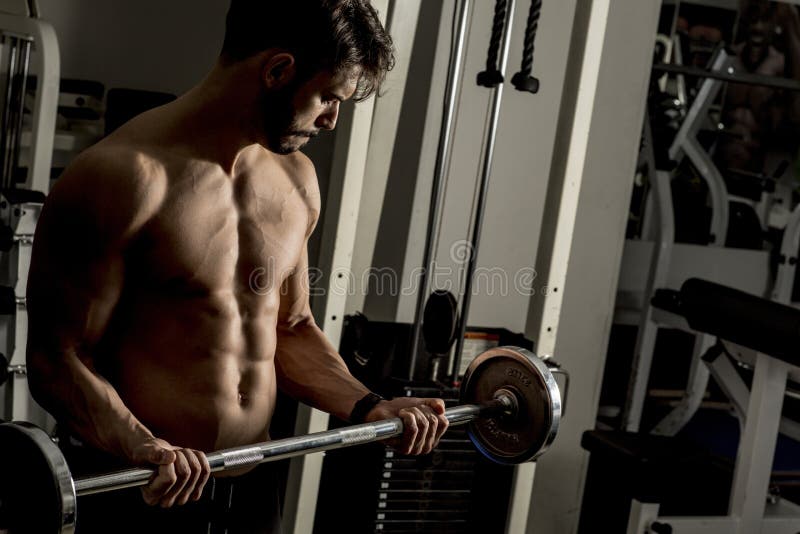 Young Man Training in the Gym Stock Photo - Image of energy, attractive ...