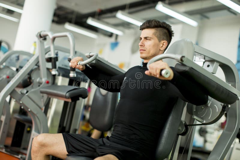 Young Man Training in the Gym Stock Image - Image of person, body: 60042769