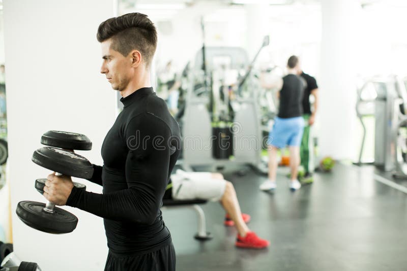 Young Man Training in the Gym Stock Image - Image of athlete, healthy ...