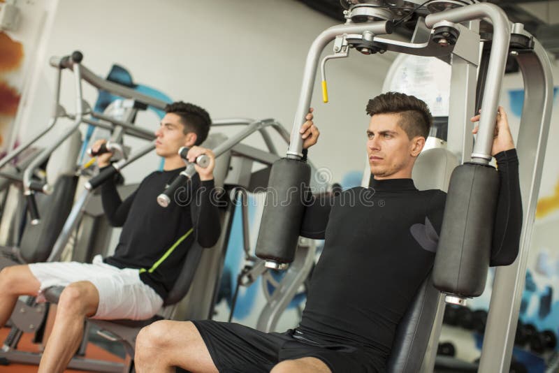 Young Man Training in the Gym Stock Image - Image of caucasian, athlete ...