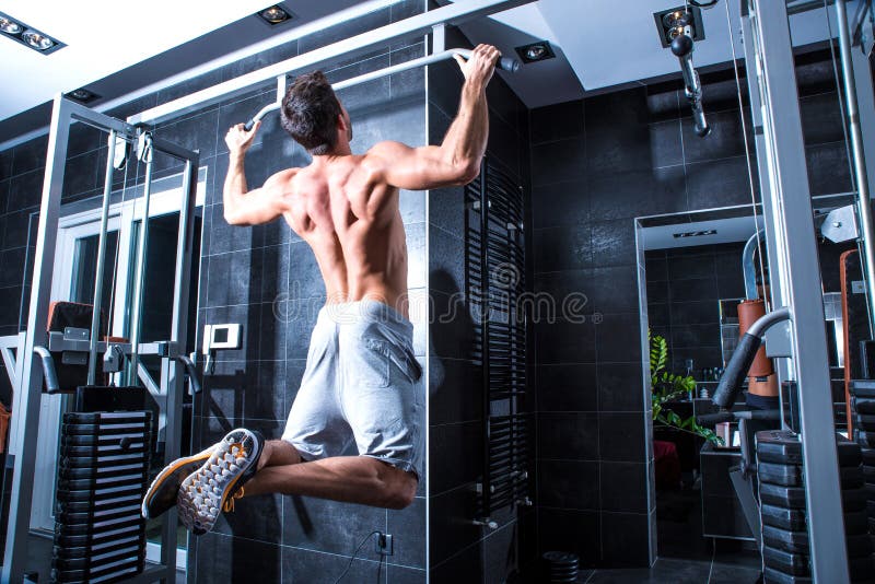 Young Man Training in the Gym Stock Image - Image of active, adult ...