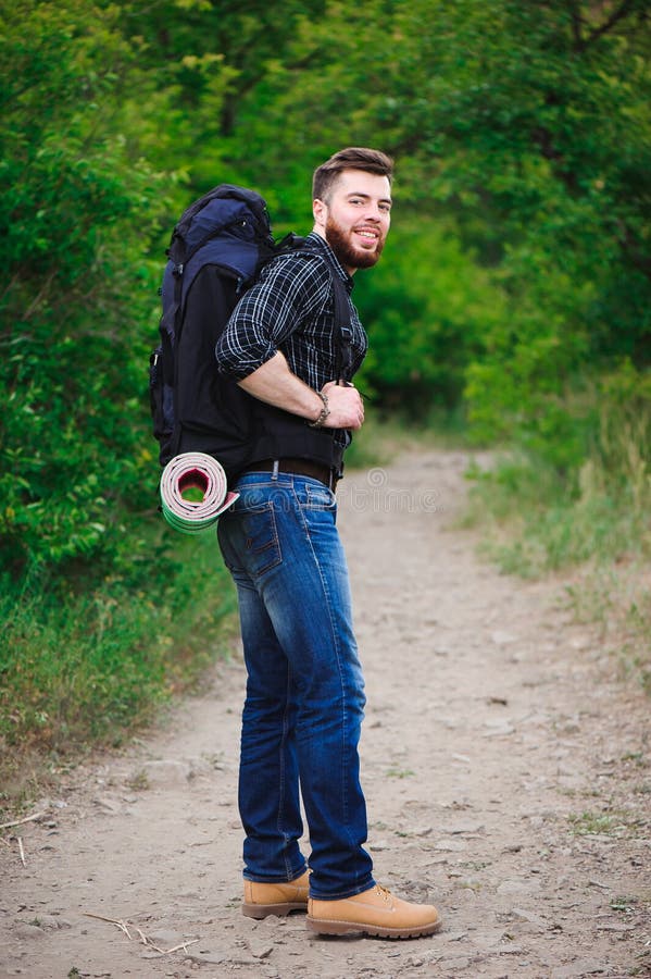 Young Man Traveler with Backpack Relaxing Outdoor. Stock Image - Image ... Young Man Traveler with Backpack Relaxing Outdoor. Stock Image - Image ...
