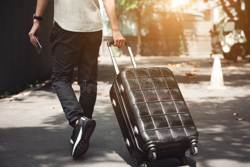 Young Man and Traveling Luggage Suitcase Walking Stock Photo - Image of ...