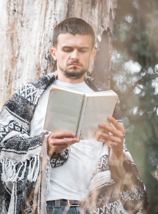 The Young Man at the Tree Reading a Book Stock Image - Image of holiday ...