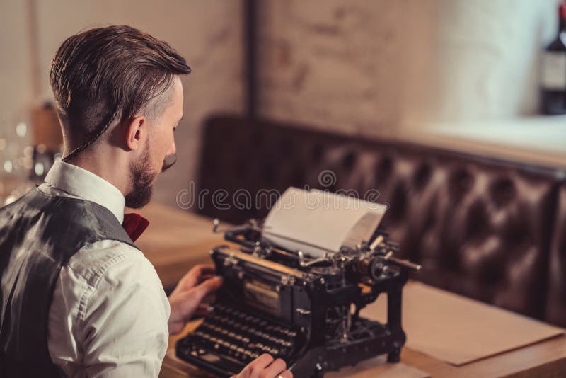 Young Man Typing on a Retro Typewriter Stock Photo - Image of retro ...