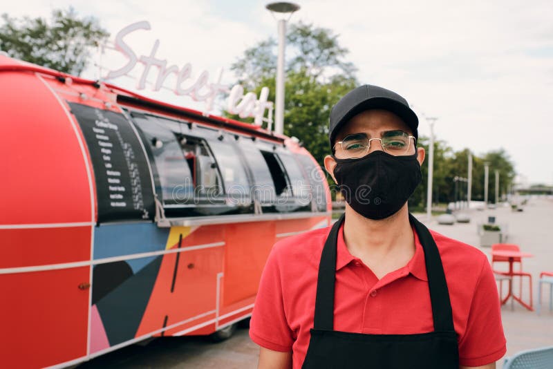 Young Man in Uniform and Black Mask Looking at Camera Stock Image ...