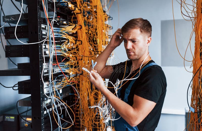 Confused Computer Engineer Looking Wires Stock Photos - Free & Royalty ...