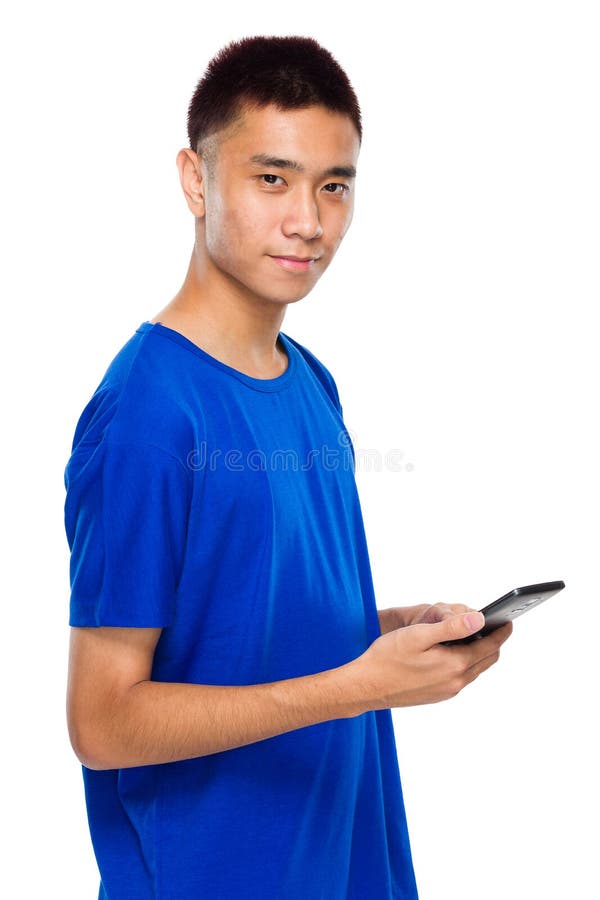 Young man use mobile phone stock image. Image of teen - 43203151