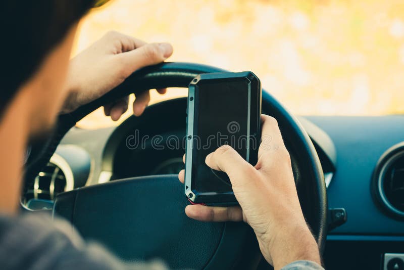 Young Man Use Smartphone in Car Stock Photo - Image of cellphone, male ...