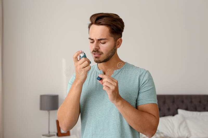 Young Man Using Asthma Inhaler Stock Image - Image of disease, medical ...