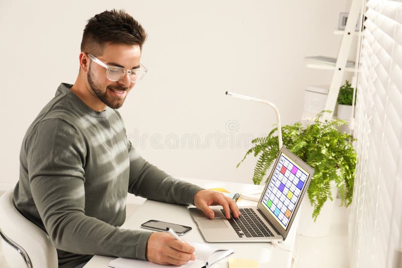 Young Man Using Calendar App on Laptop Stock Image - Image of agenda ...