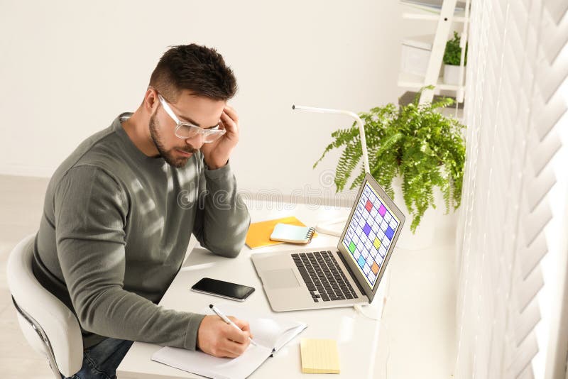 Young Man Using Calendar App on Laptop Stock Photo - Image of agenda ...