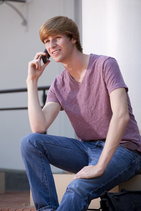 Young Man Using a Cell Phone Stock Image - Image of person, male: 20401893