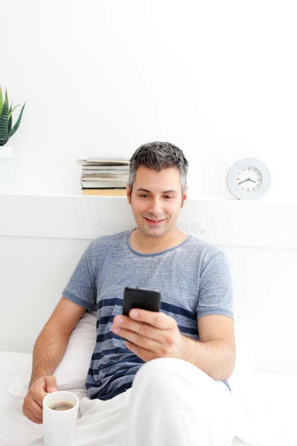 Young man using cell phone stock image. Image of message - 80196261