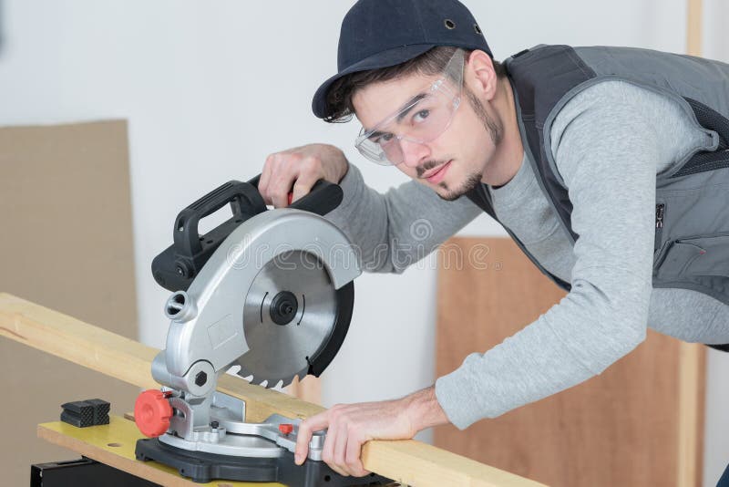 Young Man Using Circular Saw Stock Photo - Image of wood, build: 120757268
