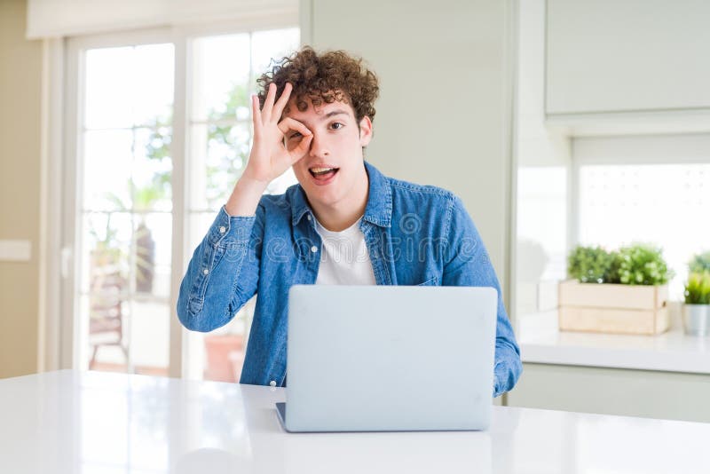 Young Man Using Computer Laptop with Happy Face Smiling Doing Ok Sign ...