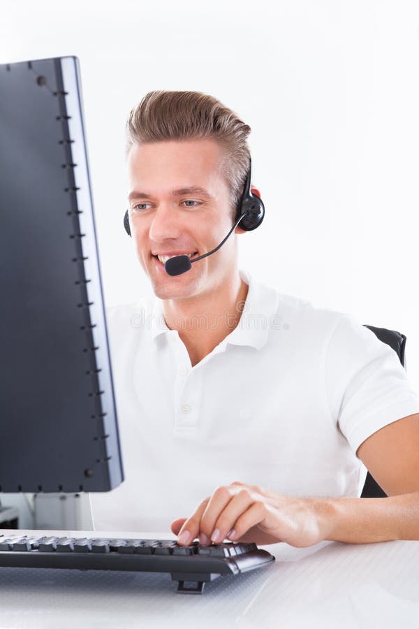 Young Man at Home Using a Computer Stock Photo - Image of screen ...