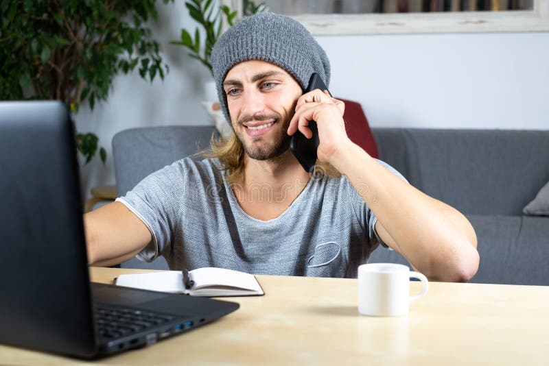 Young Man Using Computer Working at Home Stock Photo - Image of ...