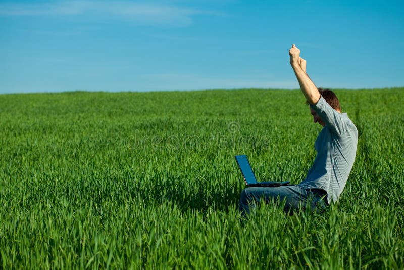 Happy Man with Computer in the Field Stock Image - Image of laptop ...