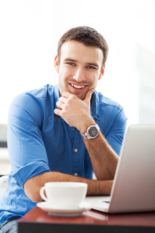 Man Using Laptop On Table Against White Background Picture. Image: 97187291