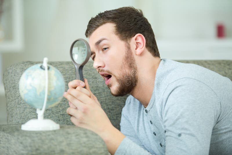 Man Looking Globe Using Magnifying Glass Photos - Free & Royalty-Free ...