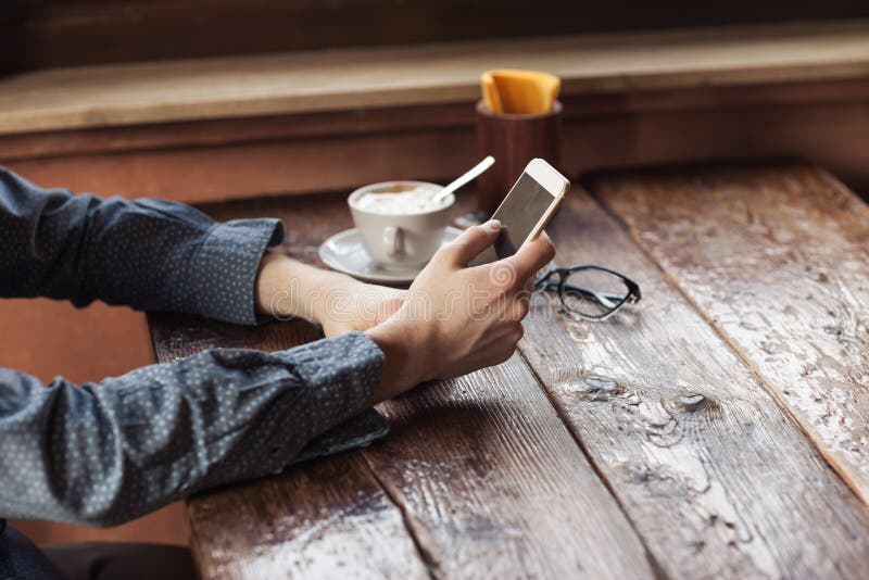 Young Man Using a Mobile Phone at the Bar Stock Image - Image of ...