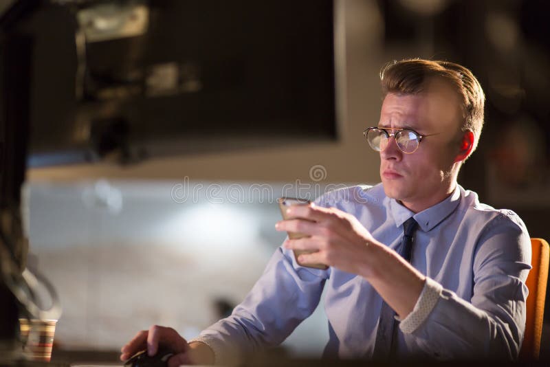Man Using Mobile Phone in Dark Office Stock Image - Image of male ...