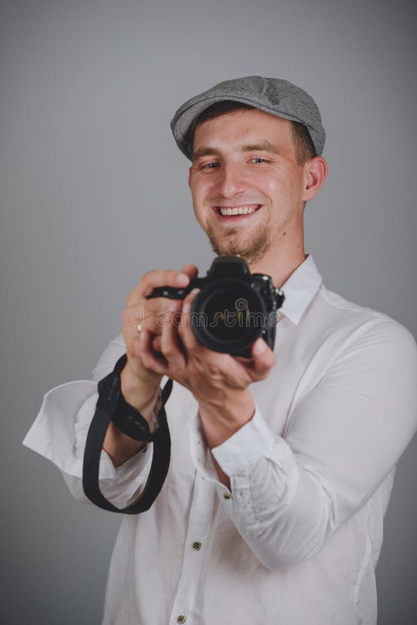 Young Man Using a Professional Camera Stock Image - Image of creativity ...