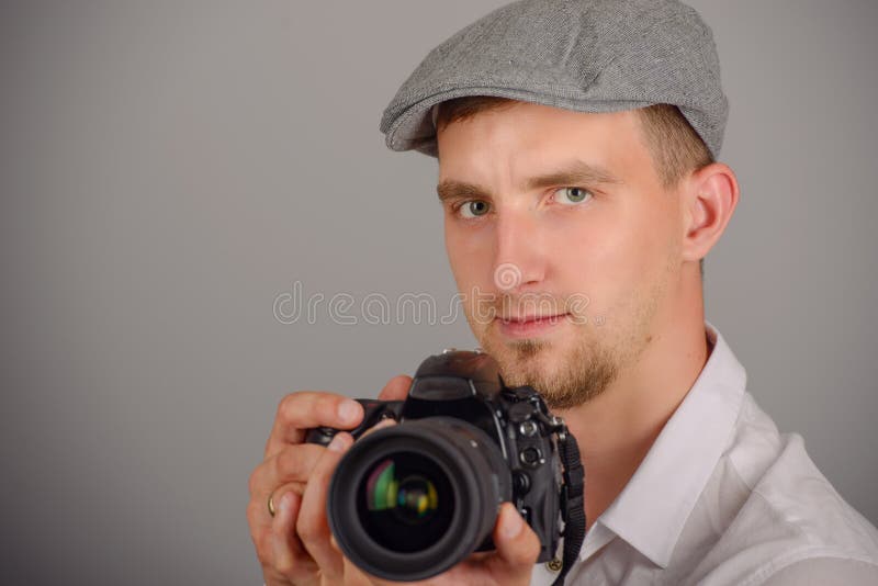 Young Man Using a Professional Camera Stock Photo - Image of adult ...