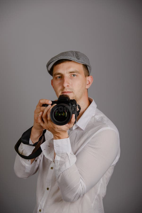 Young Man Using a Professional Camera Stock Image - Image of person ...
