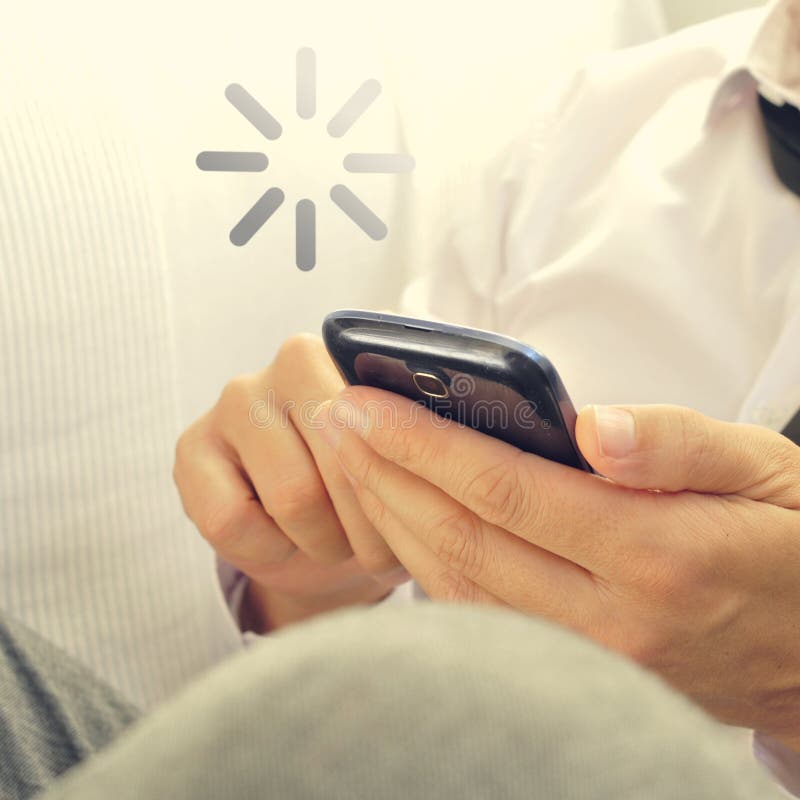 Young Man Using a Smartphone Stock Photo - Image of message, loading ...