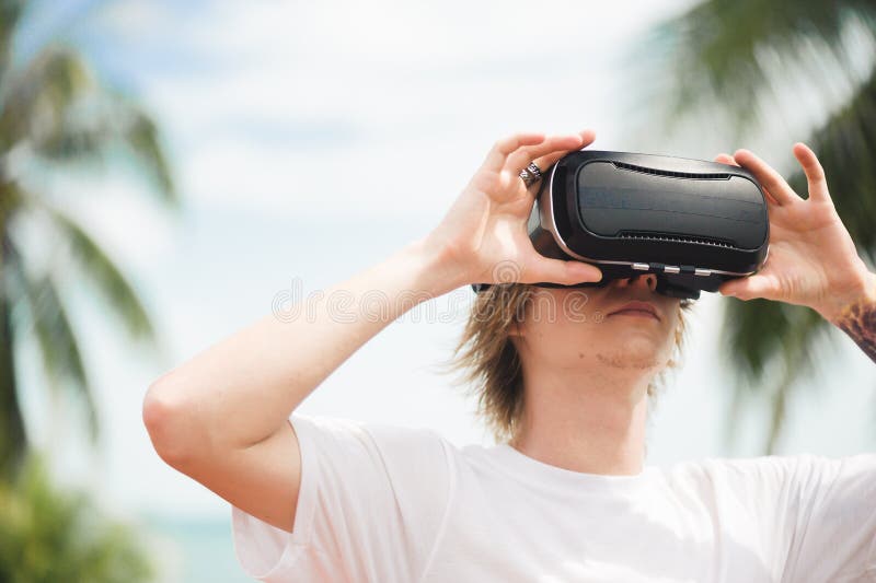 Young Man Using Virtual Reality Glasses Stock Image - Image of outside ...