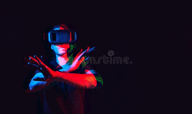 Young Man Using VR Virtual Reality Glasses Headset. with Space for Text ...