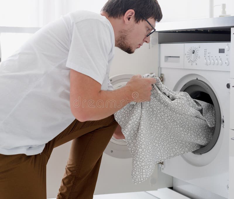 1,056 Man Using Washing Machine Stock Photos - Free & Royalty-Free ...