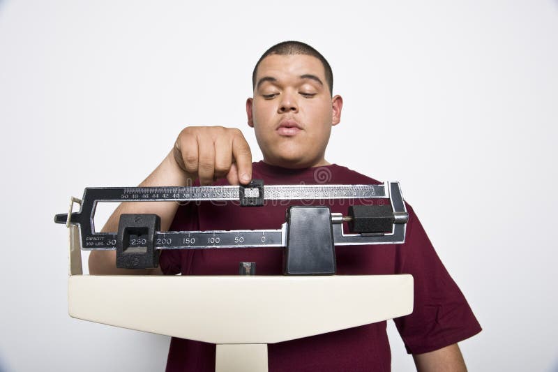 Young Man Using Weight Scales Stock Image - Image of examining ...