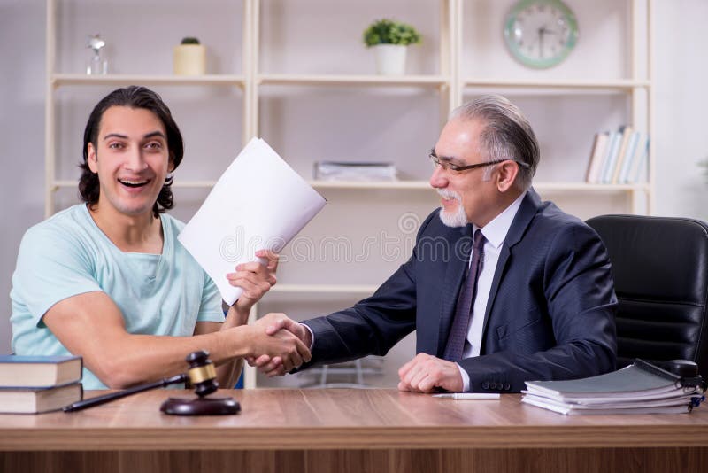 Young Man Visiting Experienced Male Lawyer Stock Image - Image of ...