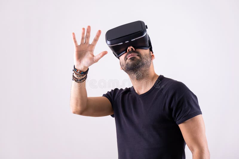 Young Man in VR Glasses Headset Gesturing Portrait. Virtual Reality ...