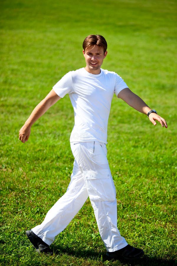 Young man walking stock photo. Image of summer, human - 14120940