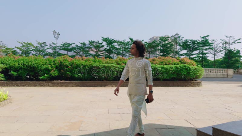 Young Man Walking on Pathway in Building Compound Walk on Street with ...