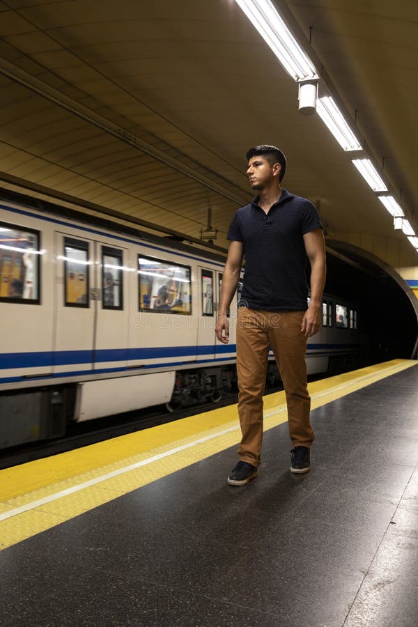 Young Man Walking in the Subway Station Stock Image - Image of male ...