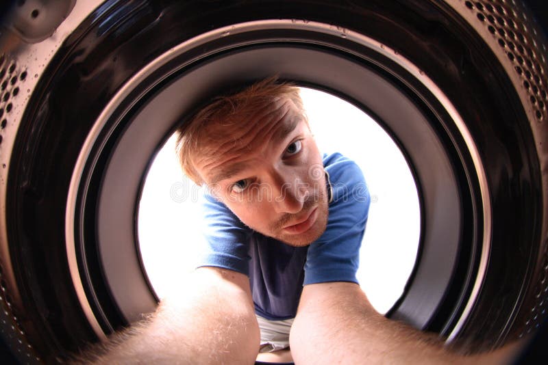 Man in the washing machine stock image. Image of male - 10251869